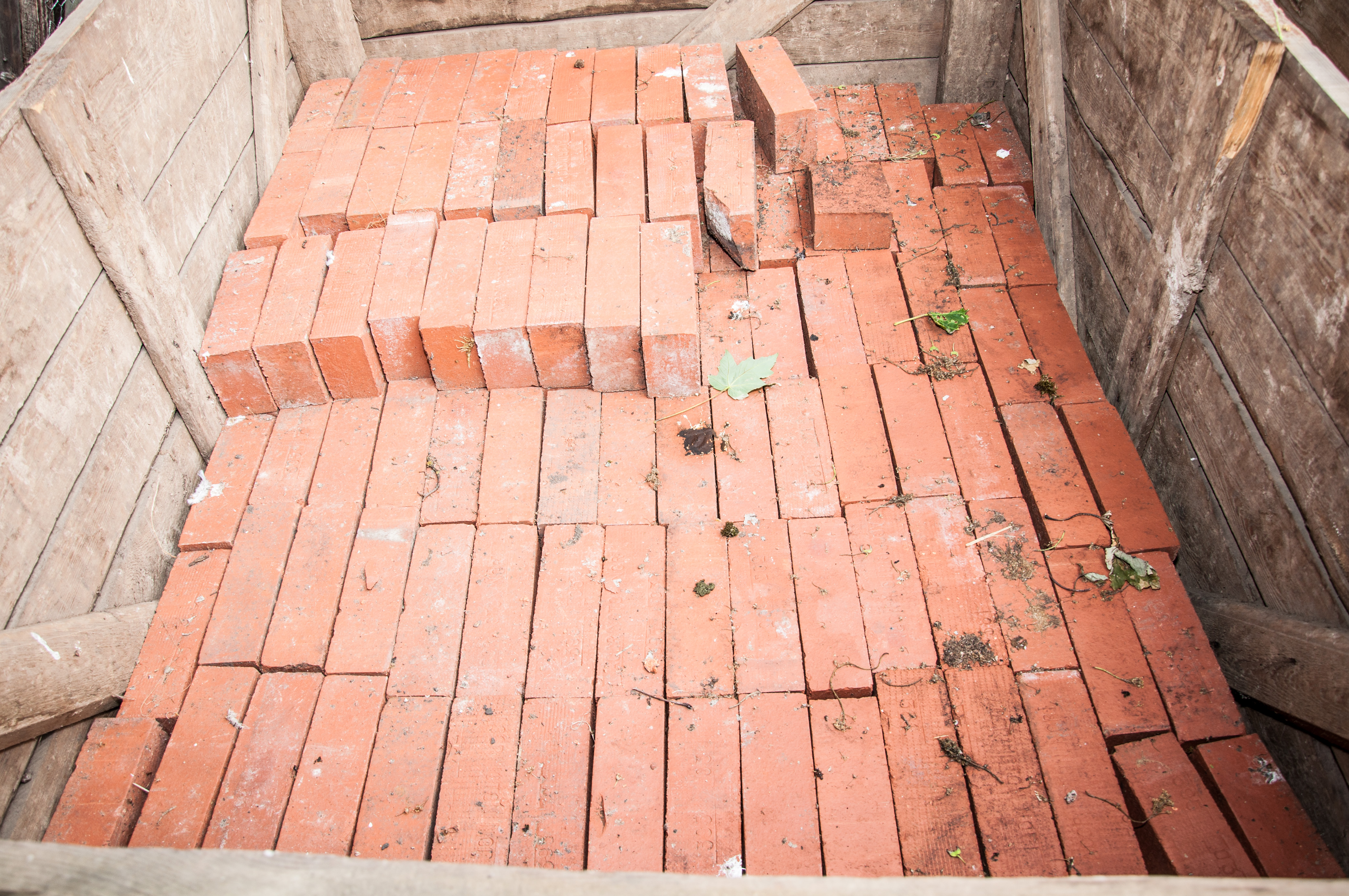 Two wooden crates of Accrington Nori engineering bricks.