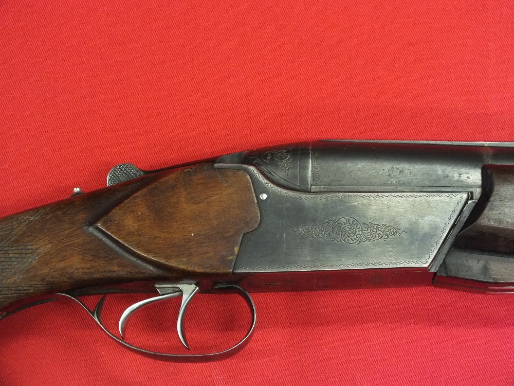 A Russian Toz 12 bore B.L.N.E. over/under shotgun with 28 1/2" barrels ...
