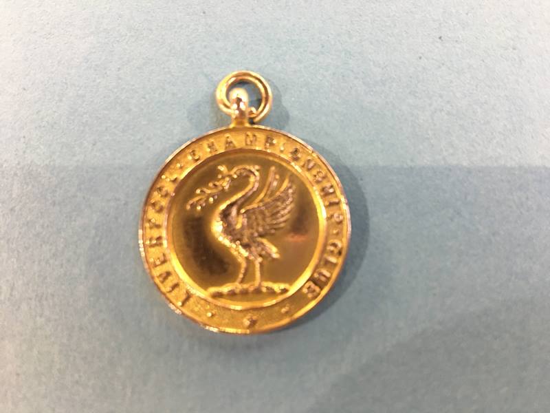 A 9ct gold medal, decorated with a liver bird and 'Liverpool ...