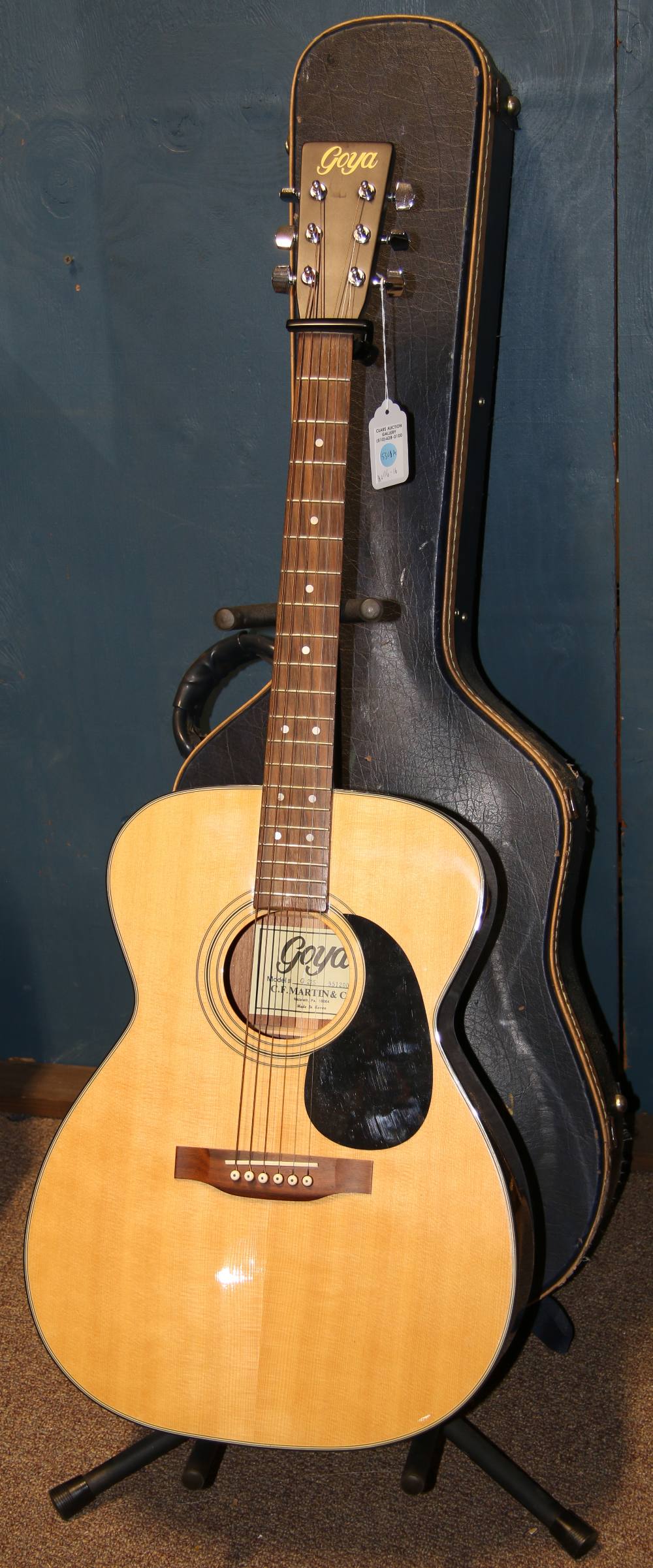 Goya acoustic guitar, model #G 215, 9510051, labeled "C.F. Martin and ...