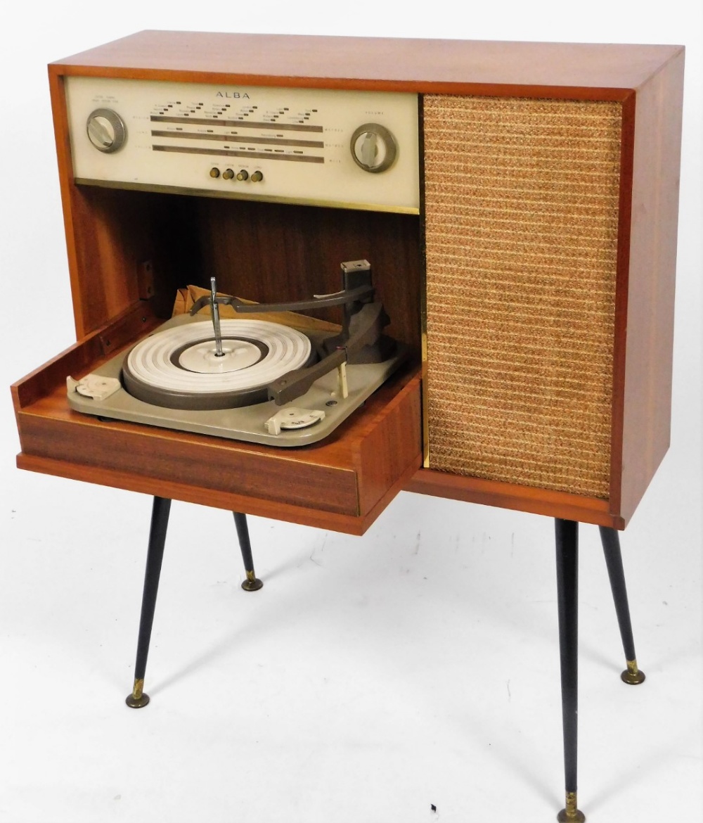 A Vintage Alba radiogram, with speaker front and articulated drawer, on ...