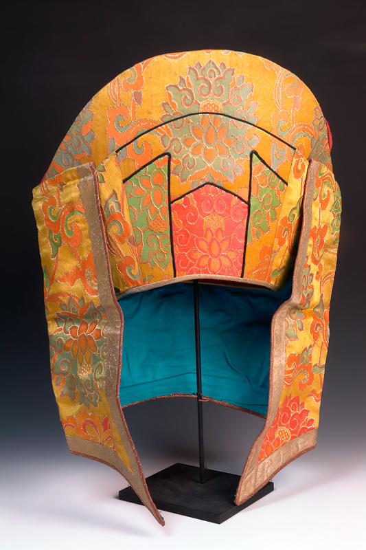 FOUR TIBETAN HATS, including black velvet monk’s hat and Kagyu hat. The ...