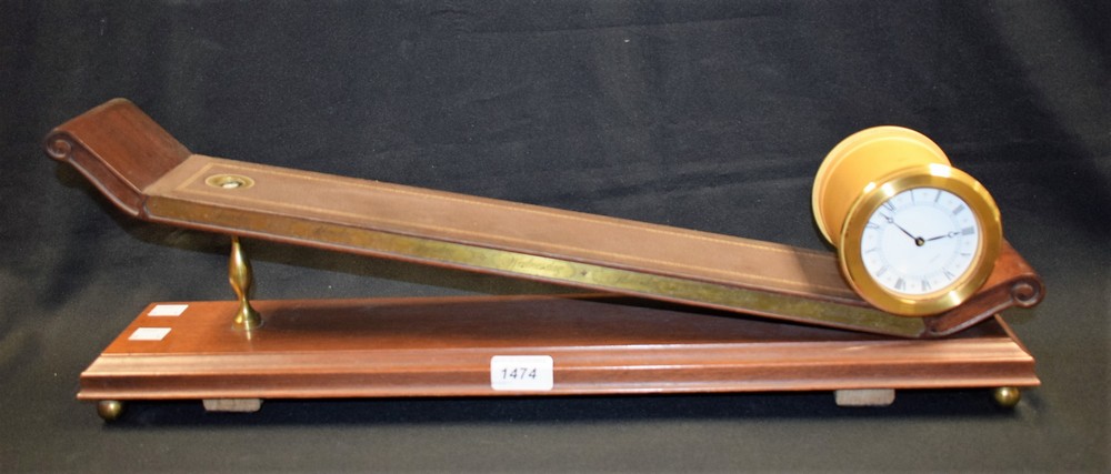 A Franklin Mint novelty Inclined Plane clock, 15 jewel movement ...