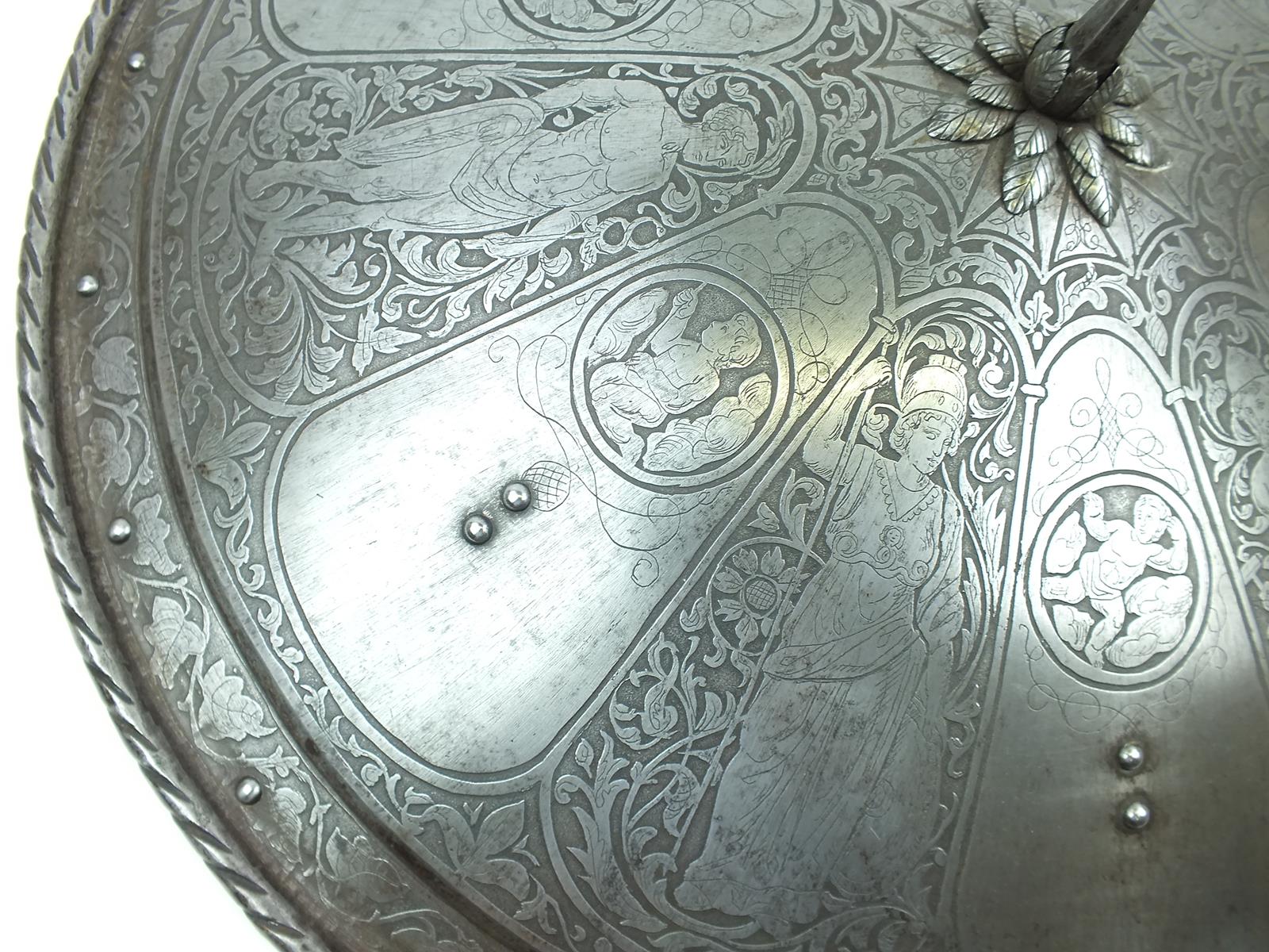 A French etched shield in the neoclassical manner, the 61cm concave ...