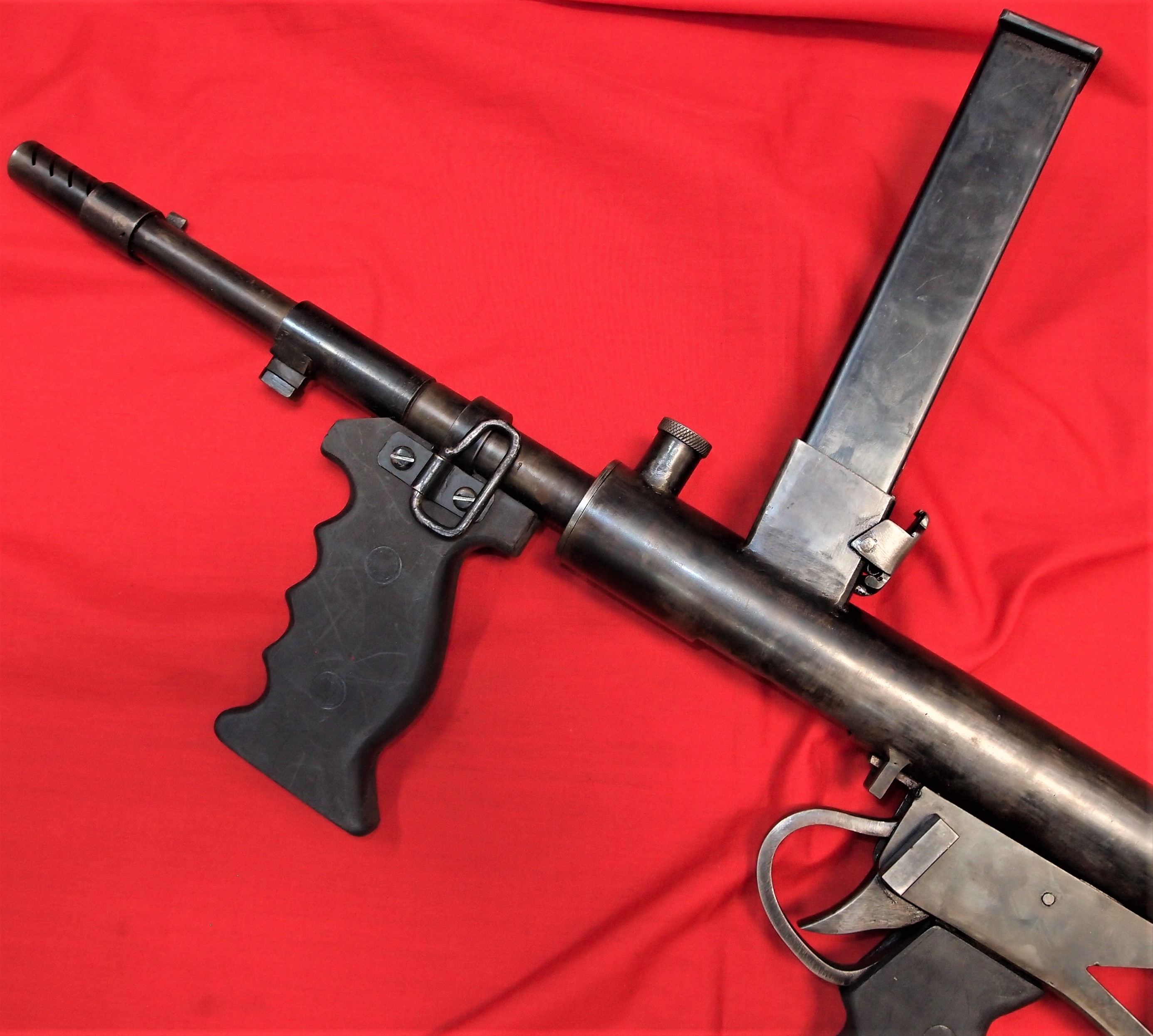 Replica WW2 Australian Owen Sub Machine Gun. Wooden butt stock attached ...