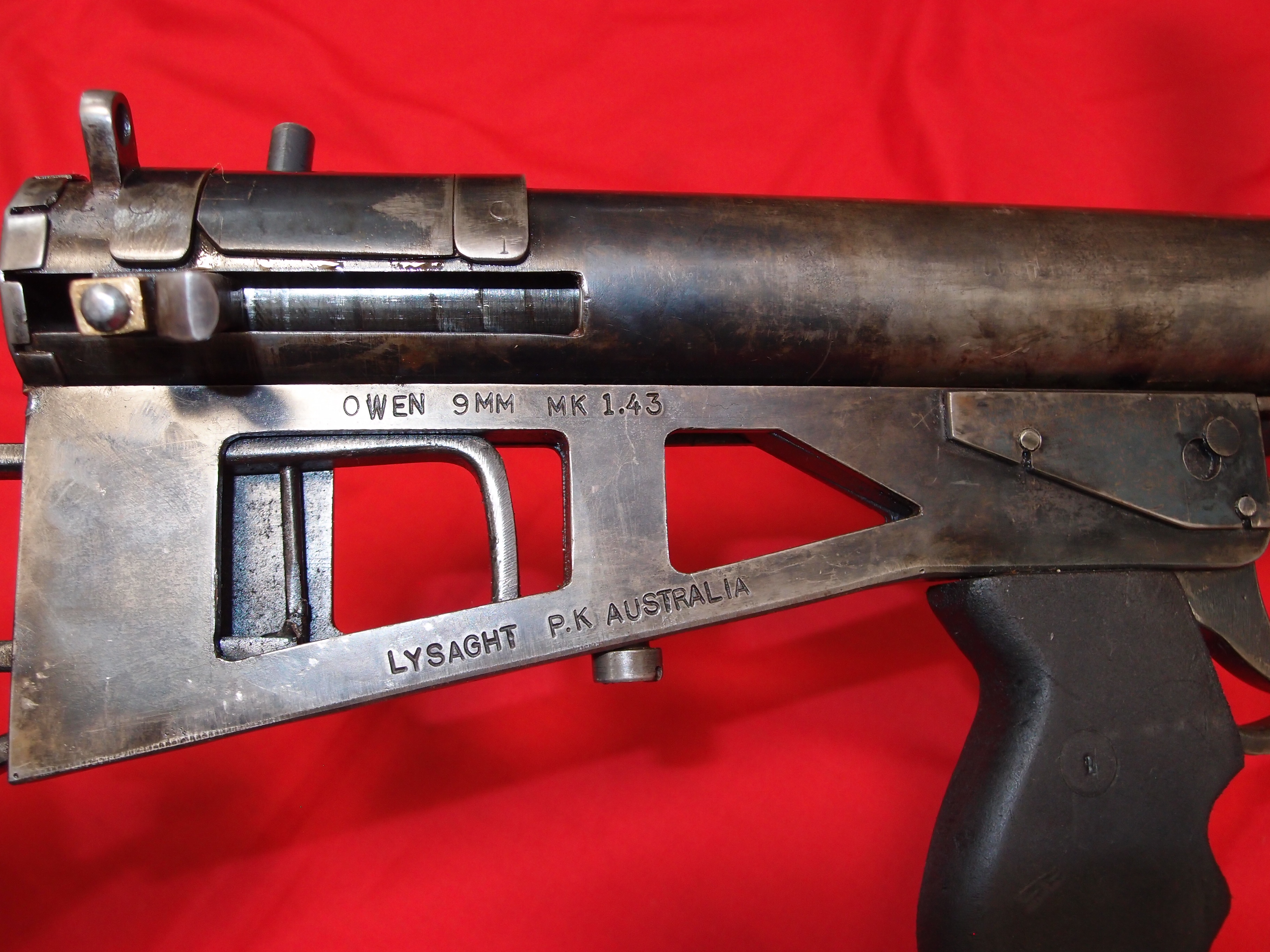 Replica WW2 Australian Owen Sub Machine Gun. Wooden butt stock attached ...