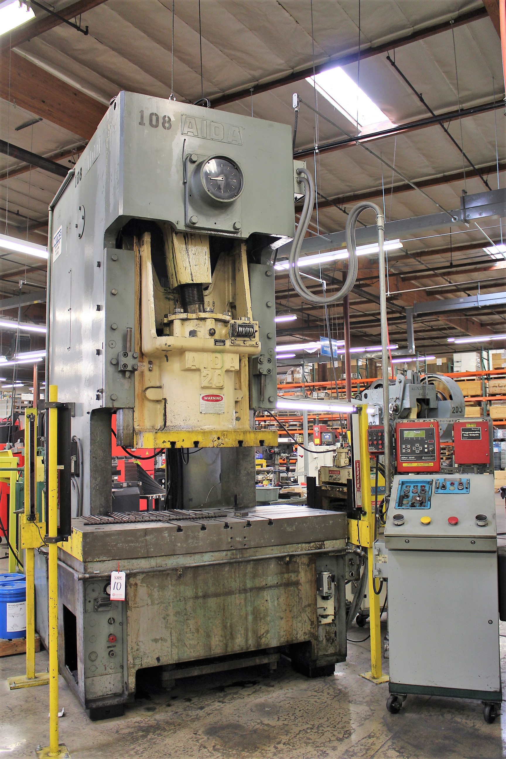 AIDA MODEL 20 PUNCH PRESS, 200-TON CAPACITY, 33 X 69.5" BOLSTER PLATE ...