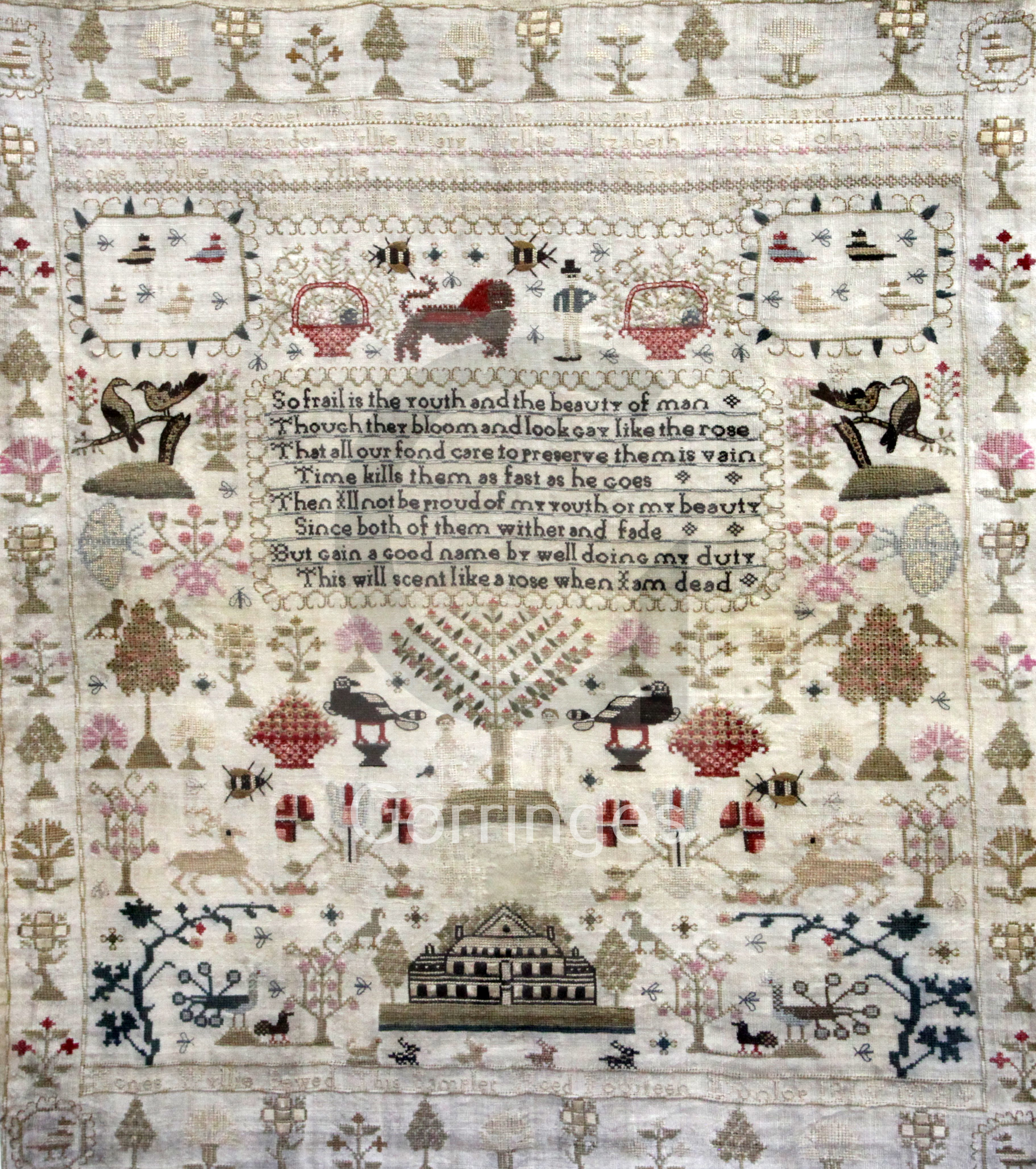 A George III needlework sampler, depicting gardens, birds, insects, a ...