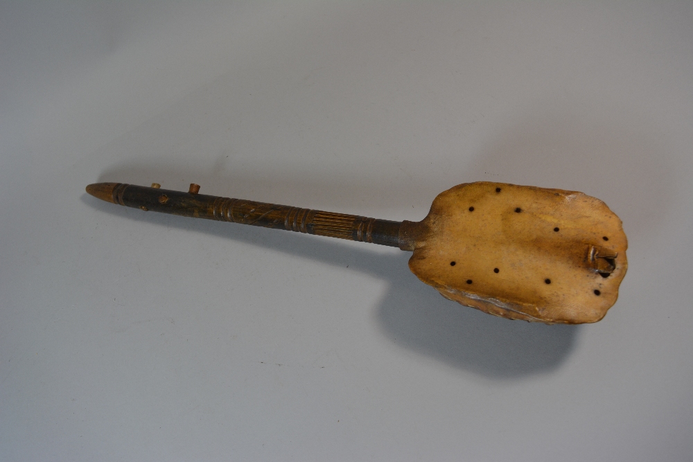 An African Two Stringed Musical Instrument Made from Leather Covered ...