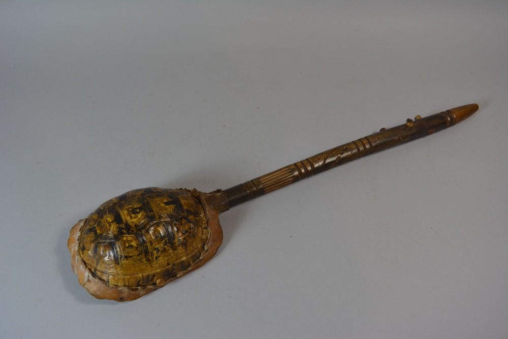 An African Two Stringed Musical Instrument Made from Leather Covered ...