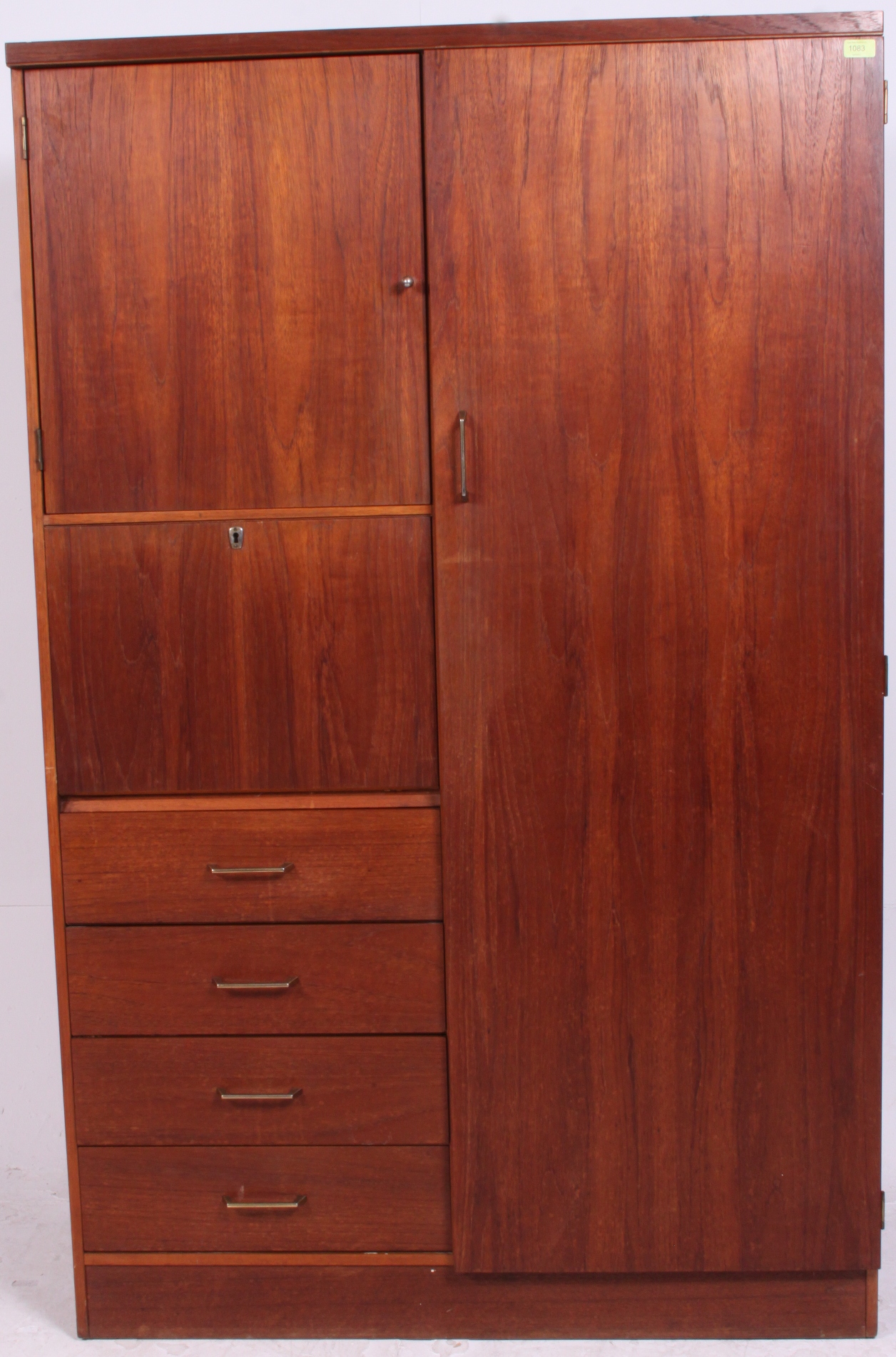 A retro 1960's Austinsuite teak wood compactum wardrobe armoire. The ...
