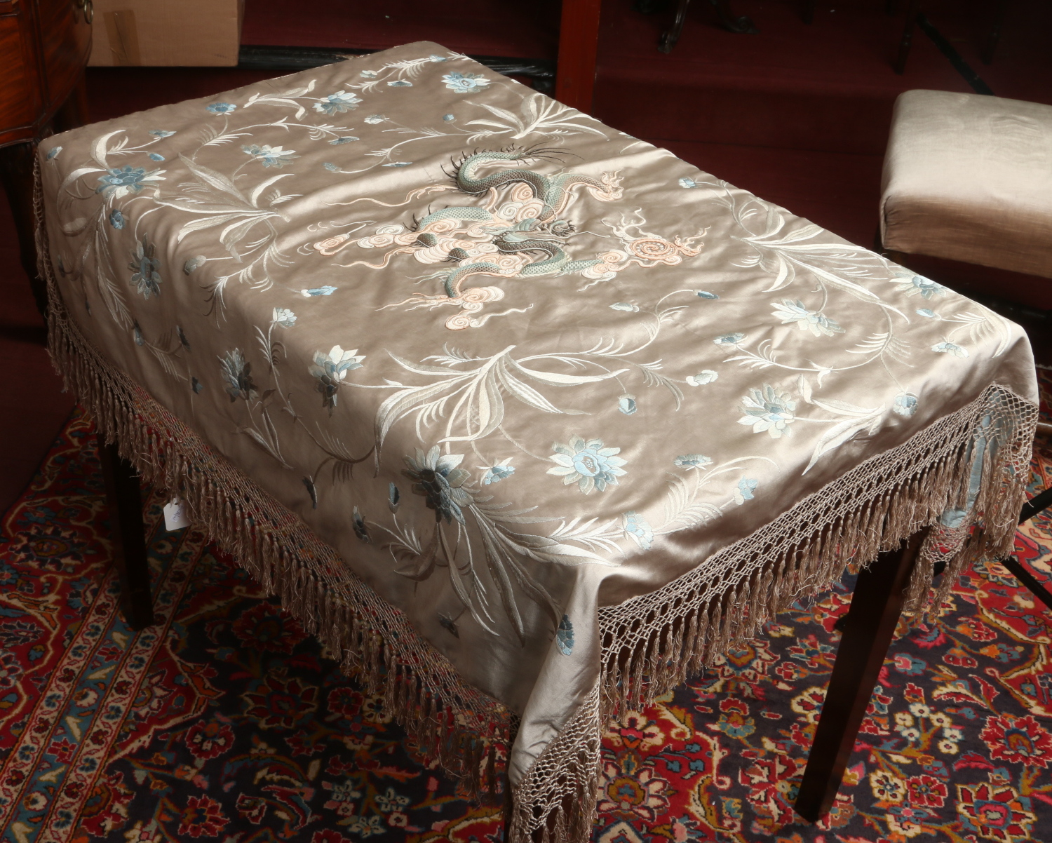 An early 20th century Chinese embroidered silk tablecloth. Decorated ...