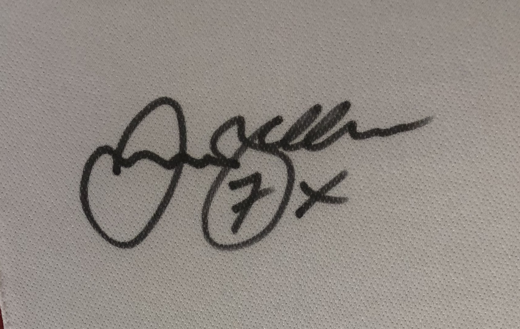 DAVID BECKHAM SIGNED ITEMS. Four signed items to include: a mounted and ...