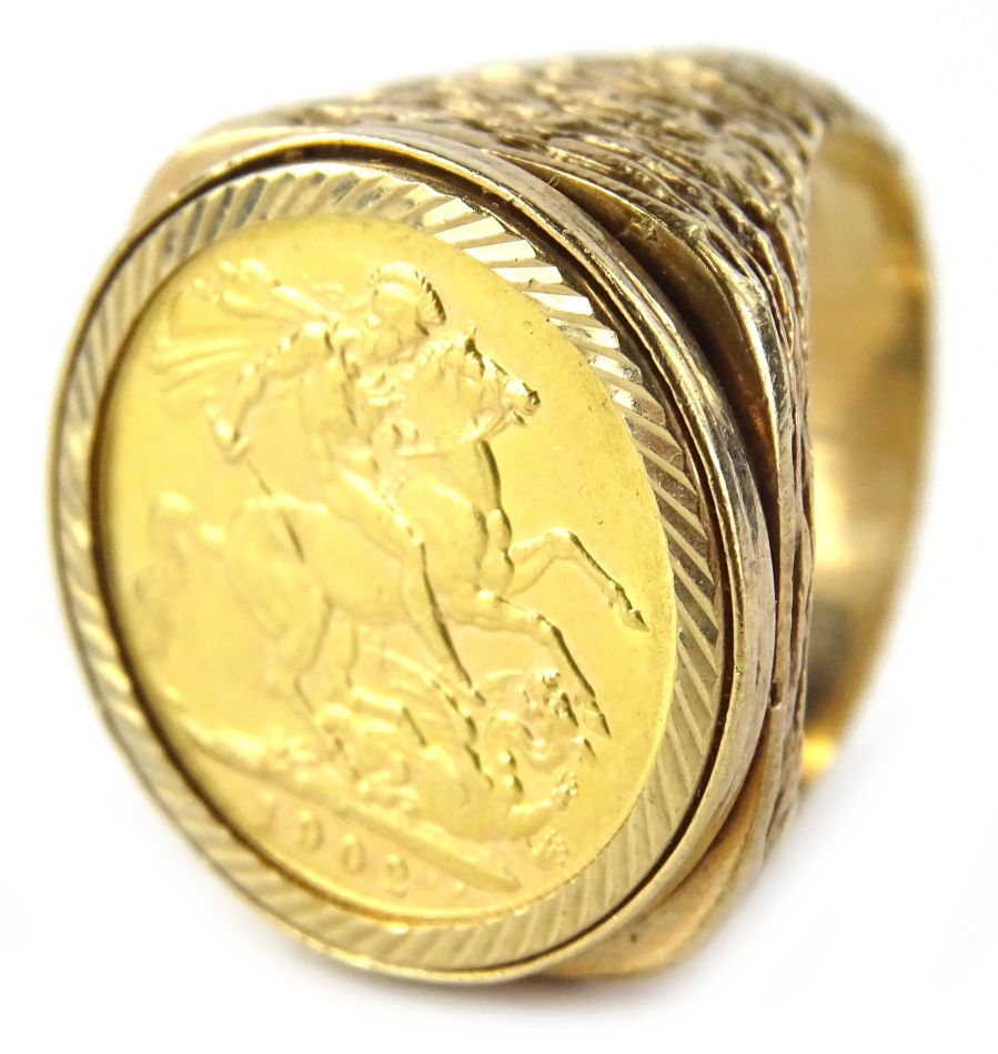 A 9ct full gold sovereign ring, containing an Edward VII 1902 full gold ...