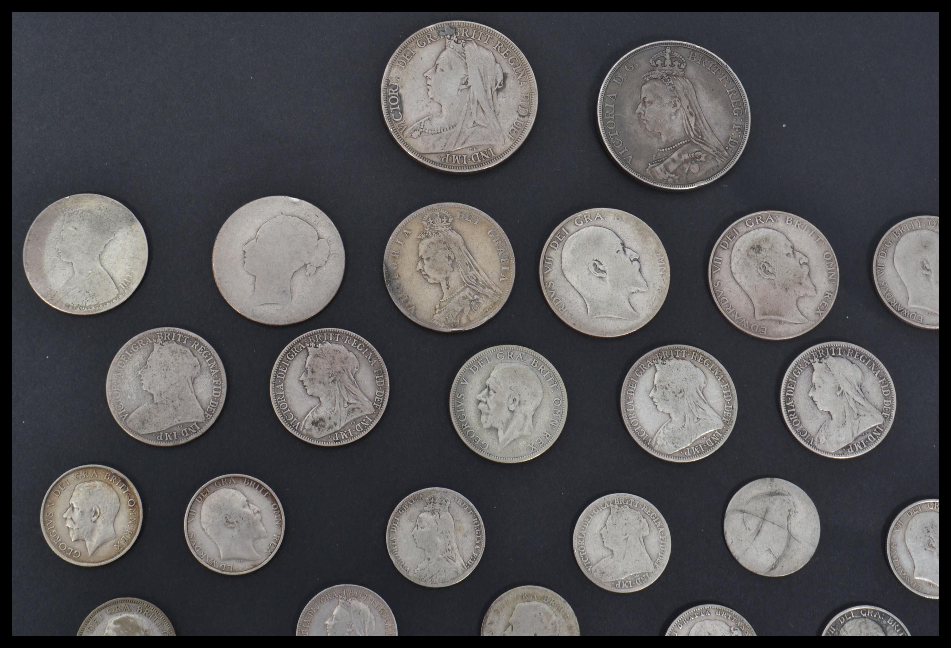 A collection of vintage and antique silver coins dating from the 19th ...