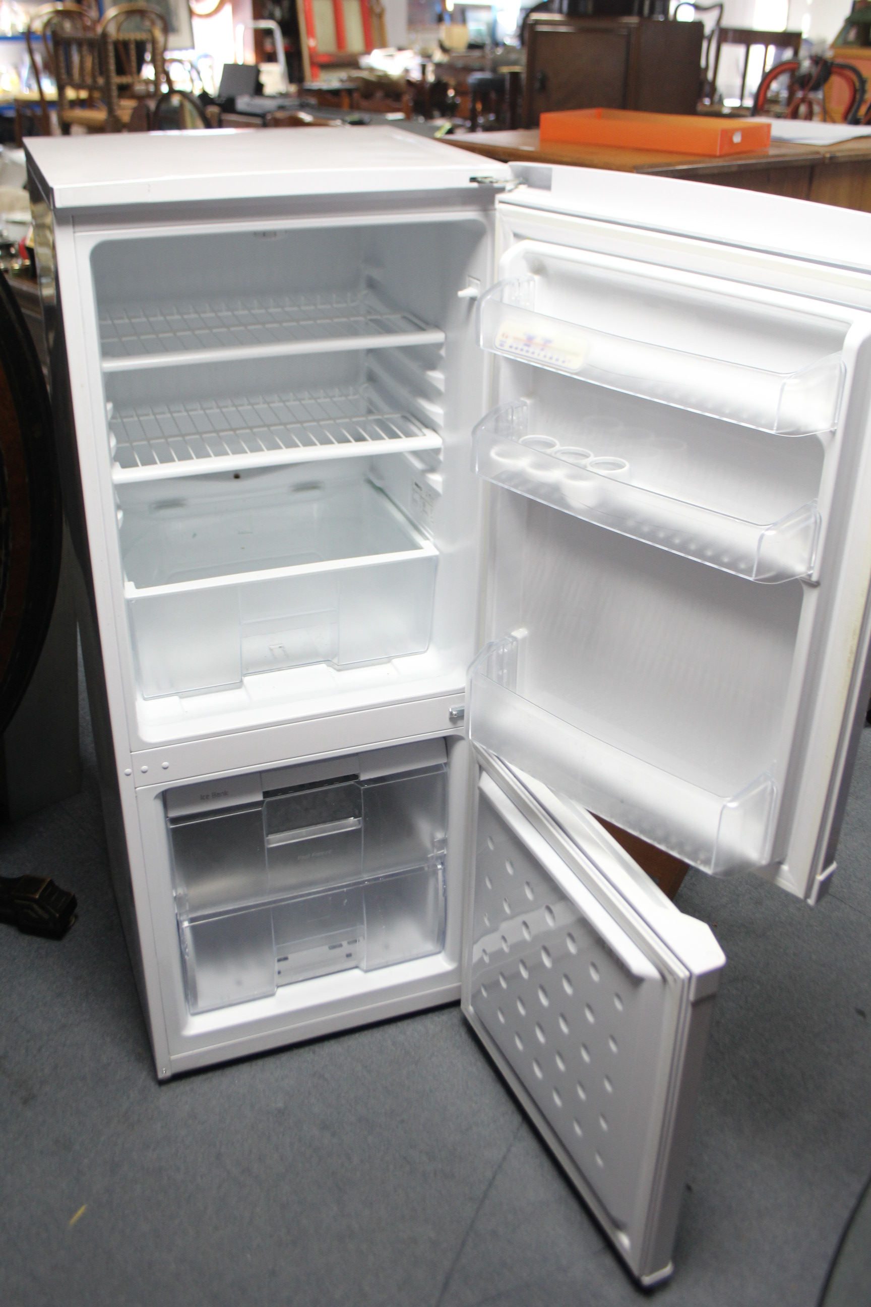A Beko A class small upright fridge-freezer in white-finish case, 53½ ...