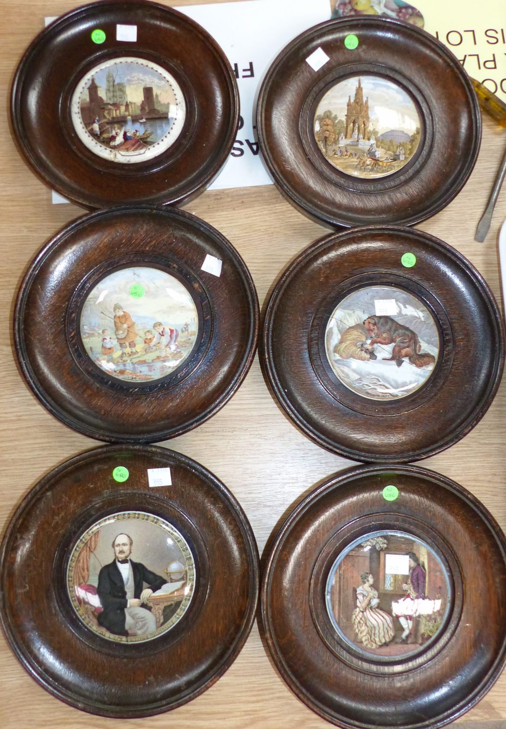 Six Victorian pot lids in turned wood frames (4 a.f.); a modern pot lid