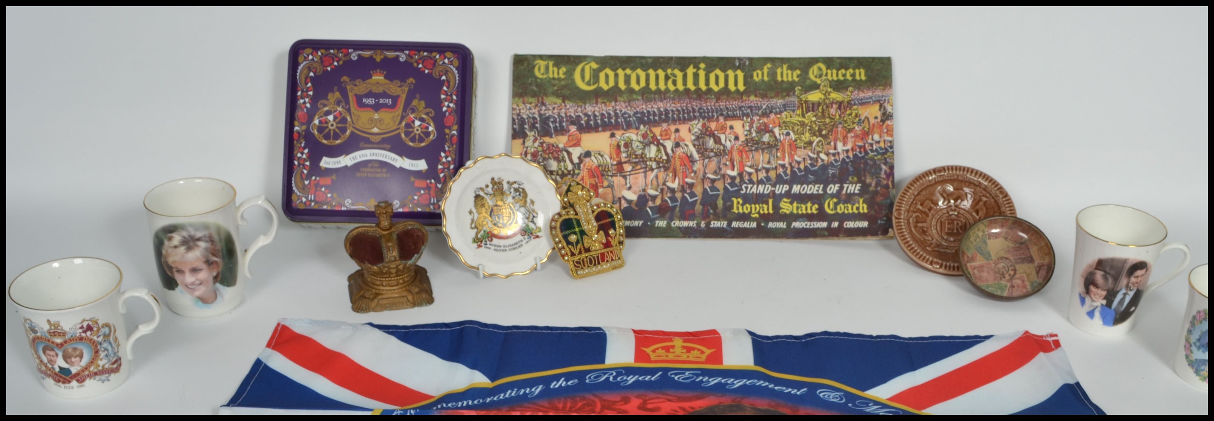 A collection of commemorative items to include a 20th century pin ...