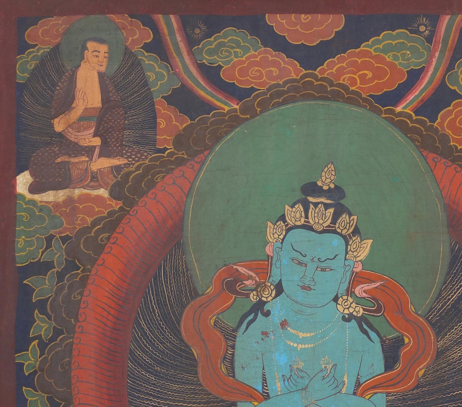 Two Tibetan watercolour on silk Thang-Ga, both with deities, the ...