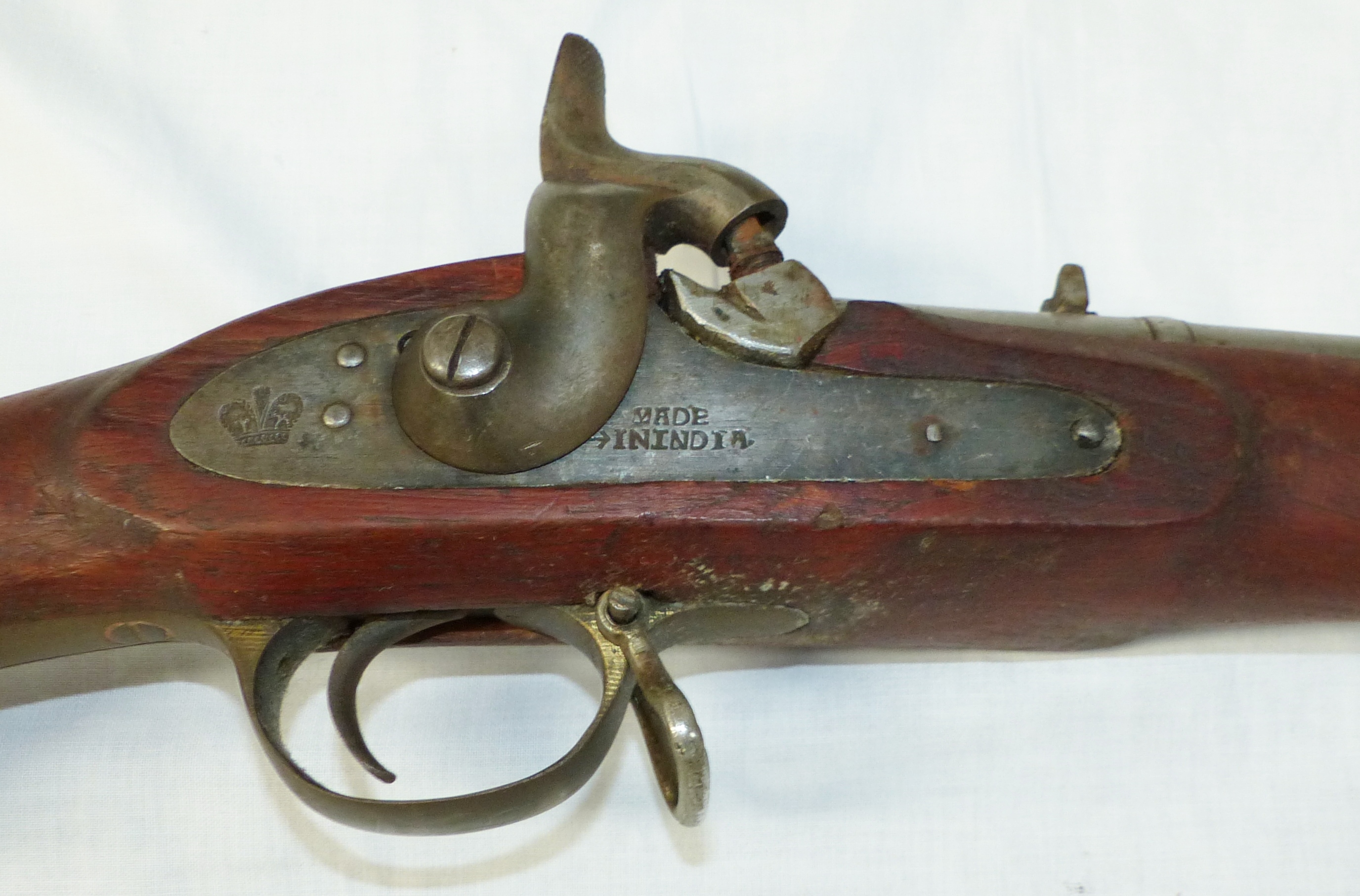 An Indian percussion cap firing musket complete with ramrod, the lock ...