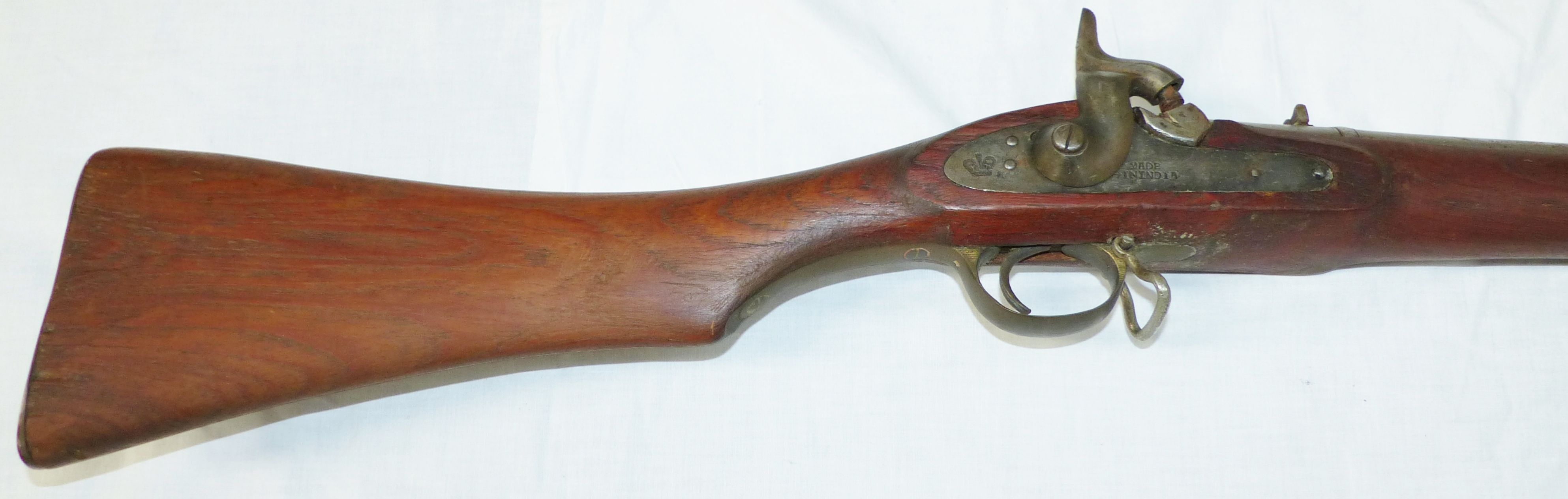 An Indian percussion cap firing musket complete with ramrod, the lock ...