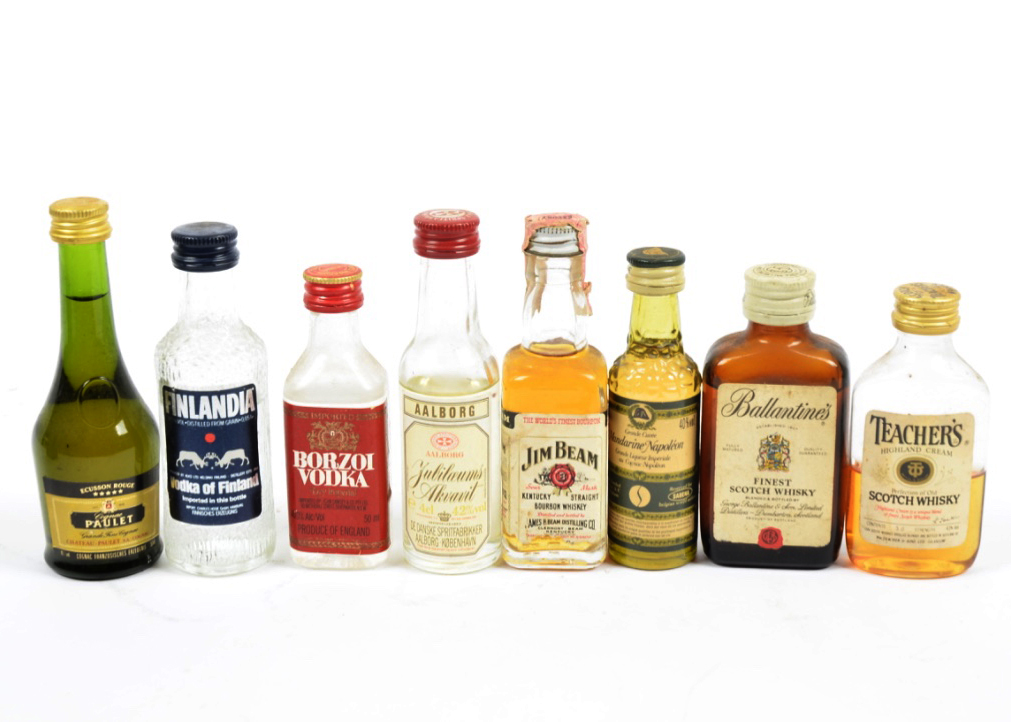 A large selection of miniature bottles of spirits and liqueurs ...