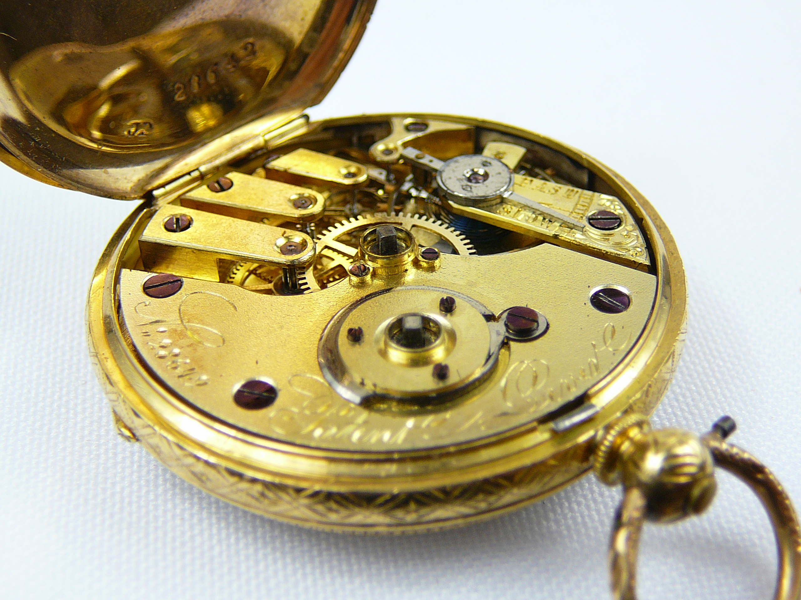 Ladies fob watch in 18ct gold engraved decorated case (38mm), key wound ...