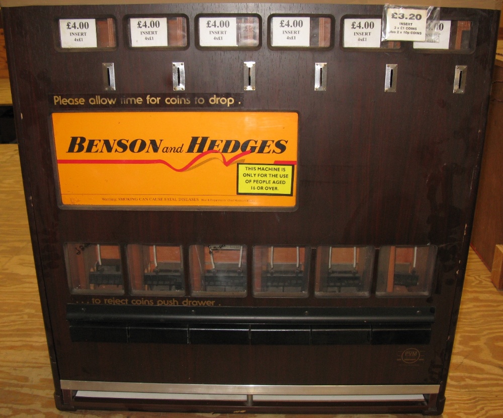 1980's cigarette vending machine for Benson & Hedges, six drawers in a ...