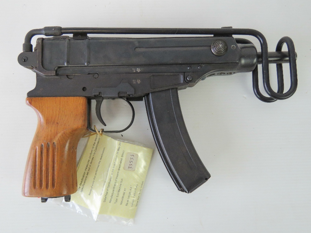 A deactivated Skorpion V261 SMG with moving replica bolt and folding ...