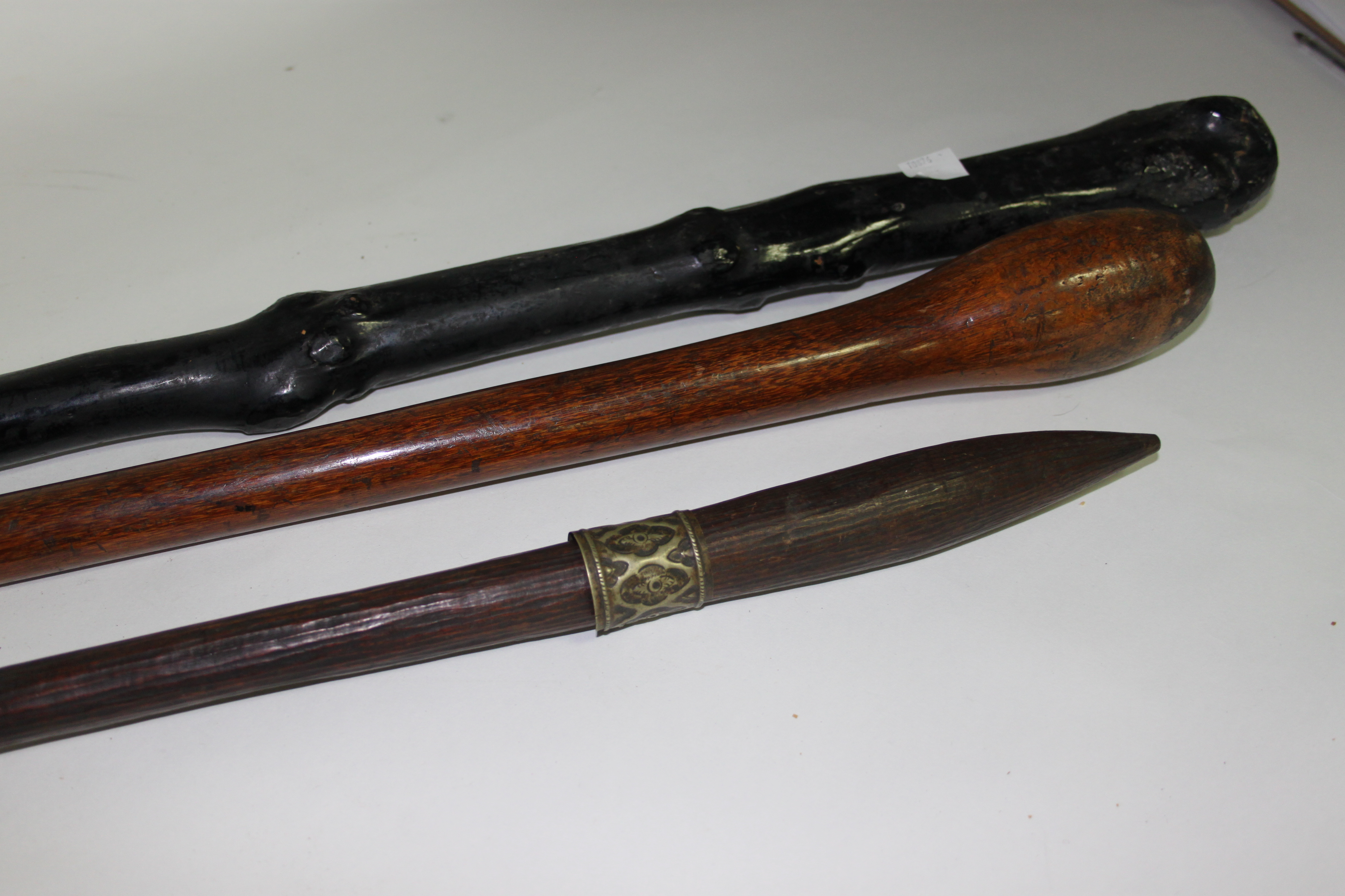 An Australian aboriginal nulla nulla or waddy club, with incised reeded ...