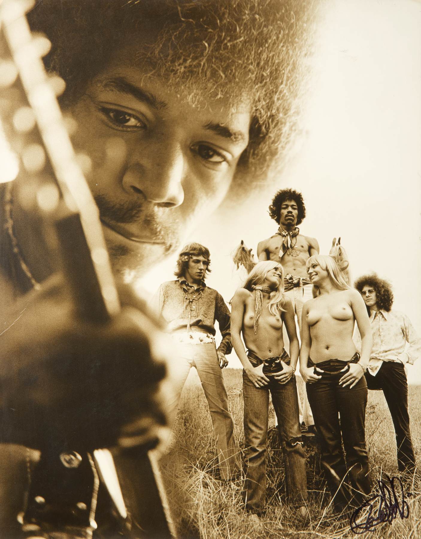 JIMI HENDRIX RON RAFFAELLI PHOTOGRAPH A sepia-toned black and white ...