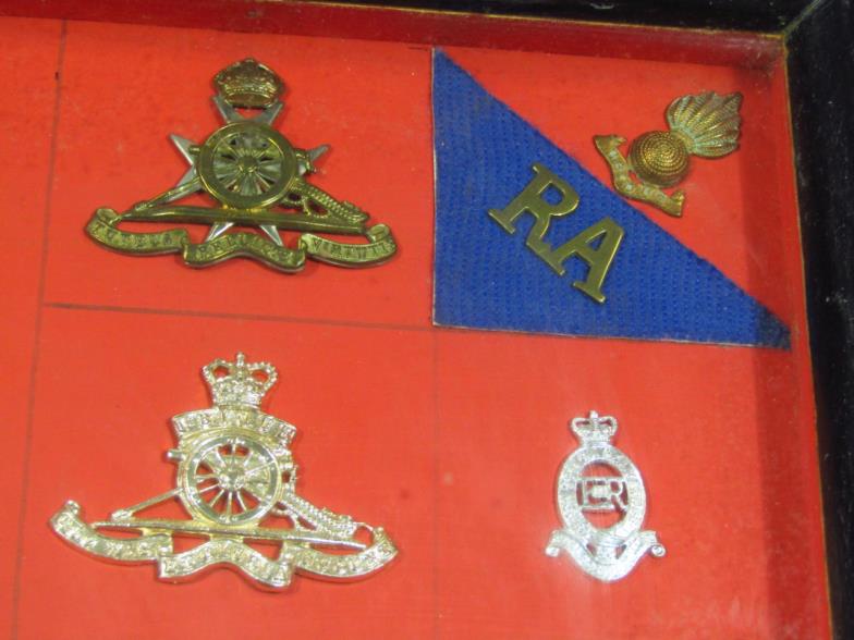 Various Army cap badges, Cannon badges, Ubique Royal Artillery ...