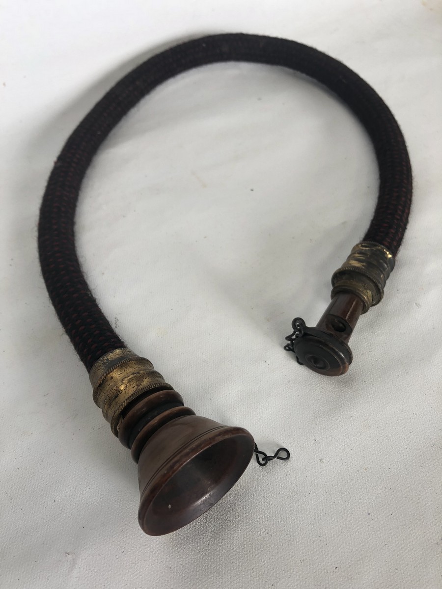 A veteran speaking tube with whistle.