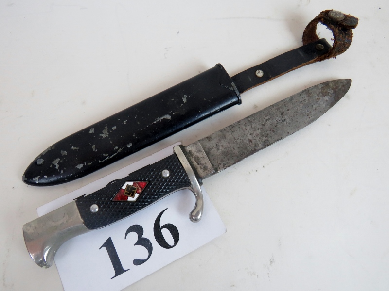 A German military knife with enamel Swastika to the handle, the 14 inch ...