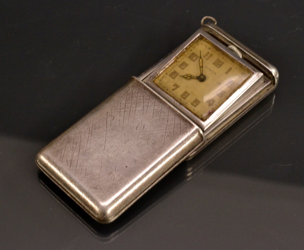 Vertex - a 1930s Art Deco silver ladies purse watch, sliding cover ...