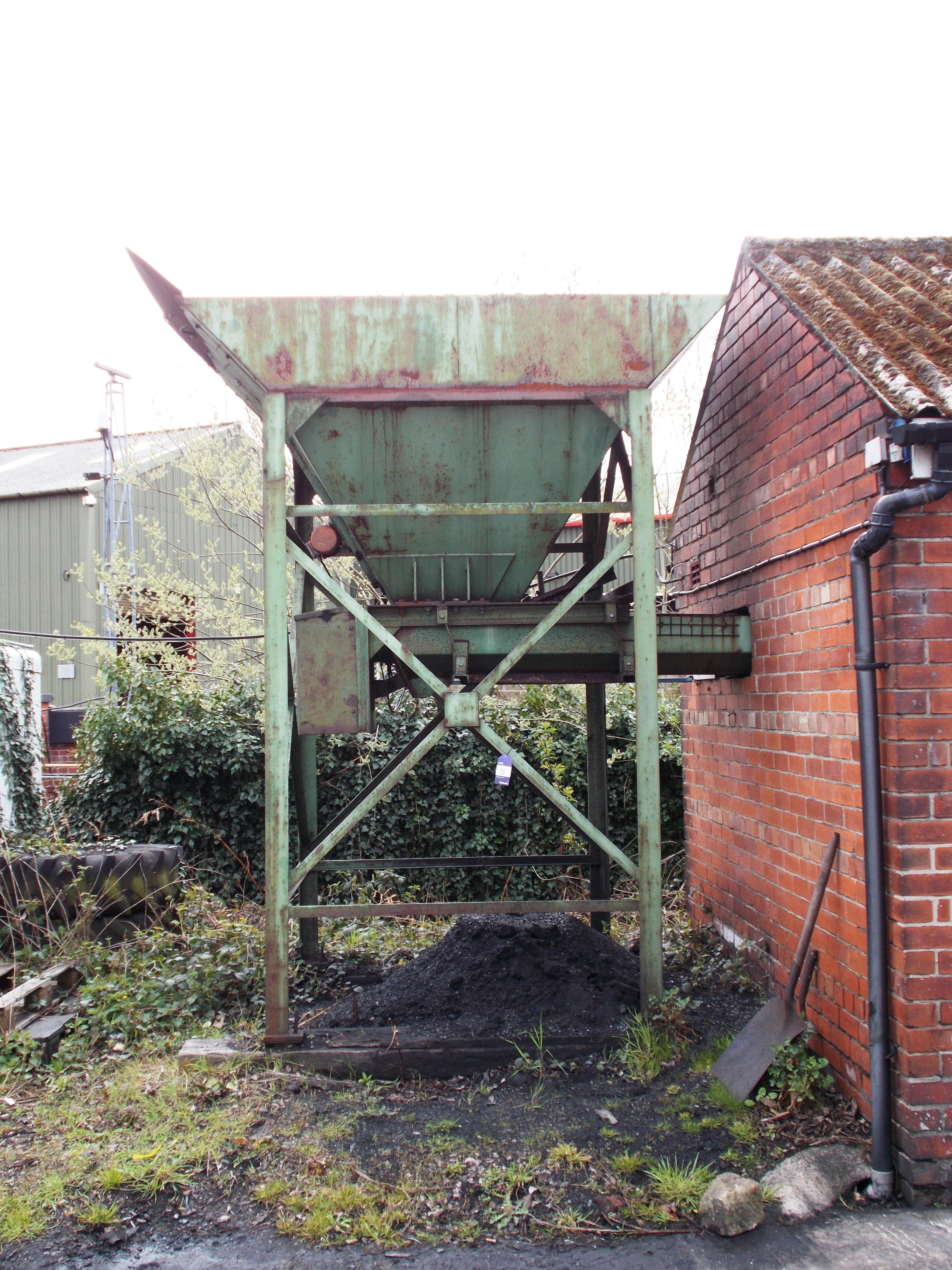 Coal hopper, with an approximate capacity of 1 tonne, equipped with ...