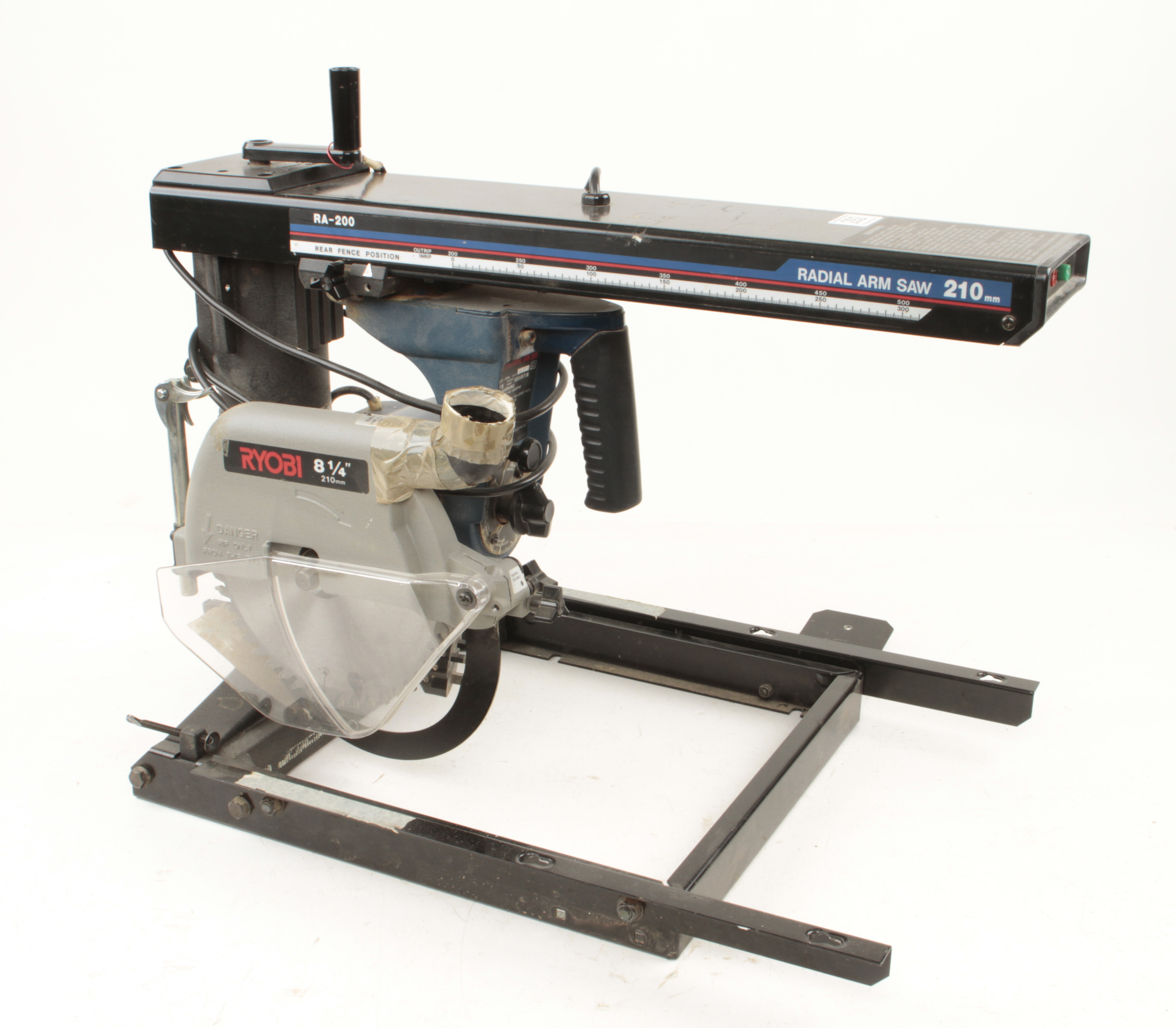 A RYOBI 210mm radial arm saw with extra blades etc G++We understand ...
