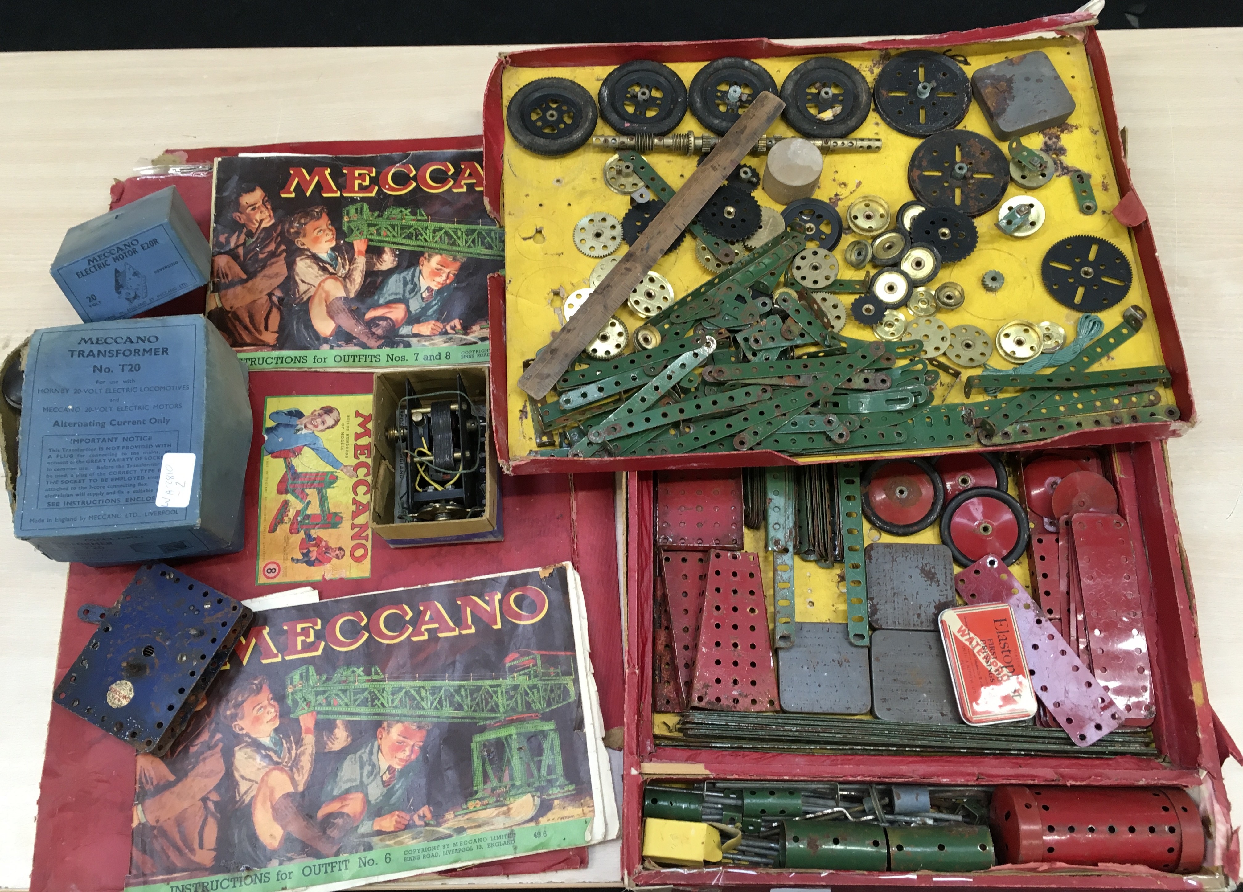 Meccano No.8 set box containing various red and green parts, wheels and ...