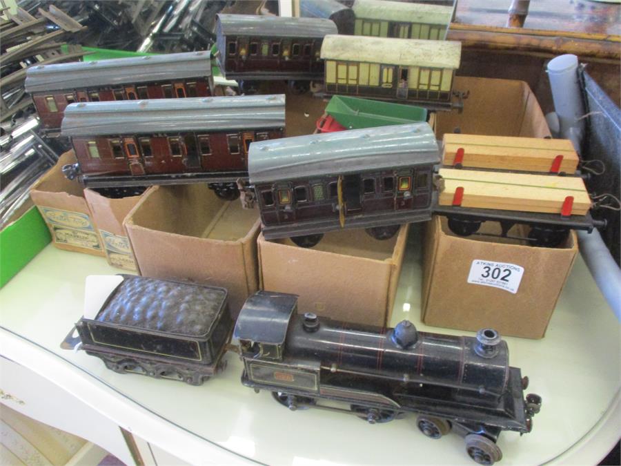 A Marklin late 19th century German Tin Plate train set comprising ...