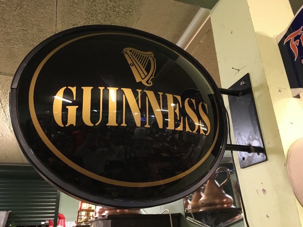 Original circular GUINNESS light up sign.