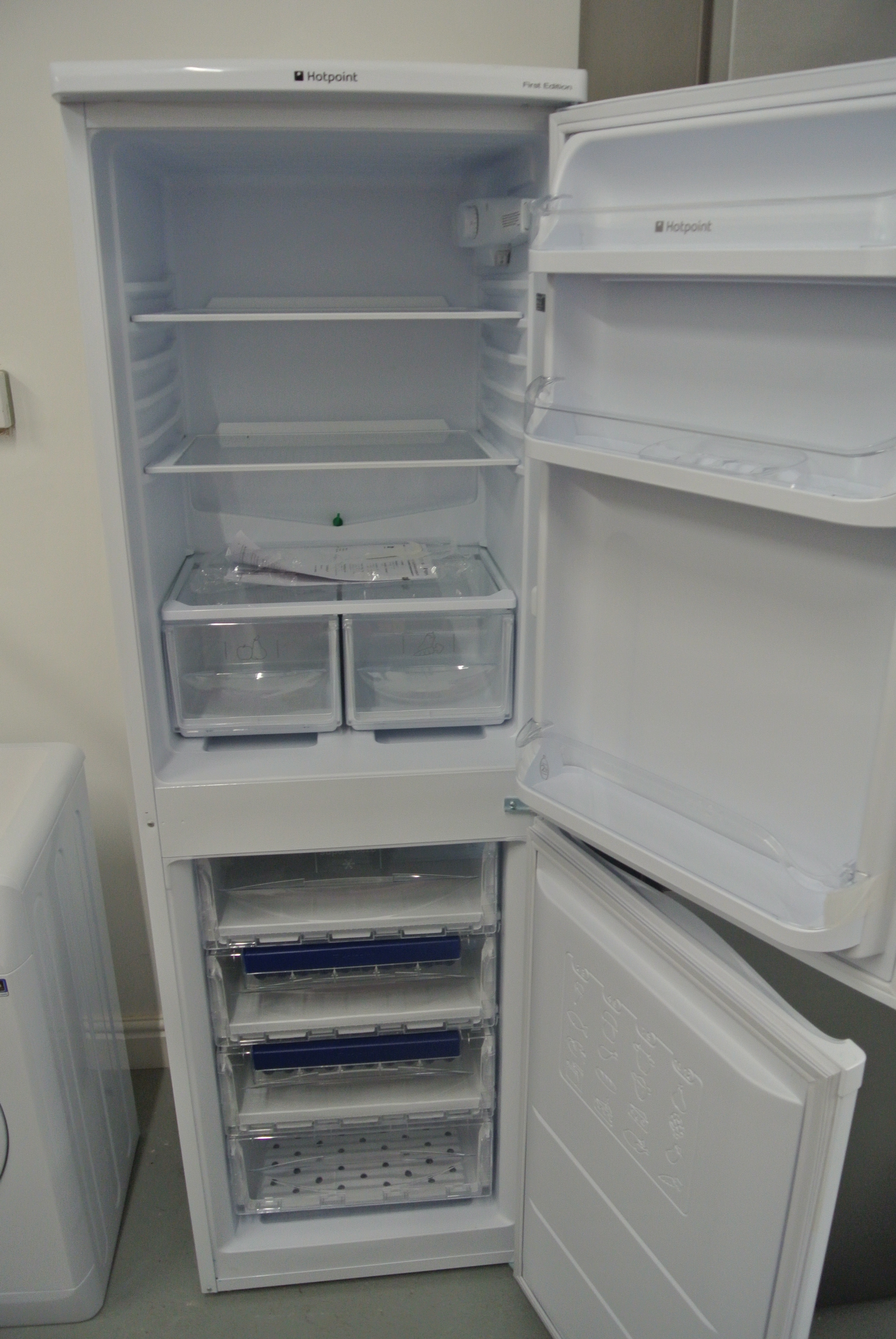A Hotpoint first edition fridge freezer - in working order