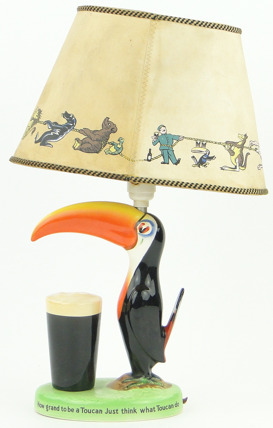 A Carltonware Guinness Toucan design table lamp, with original shade ...