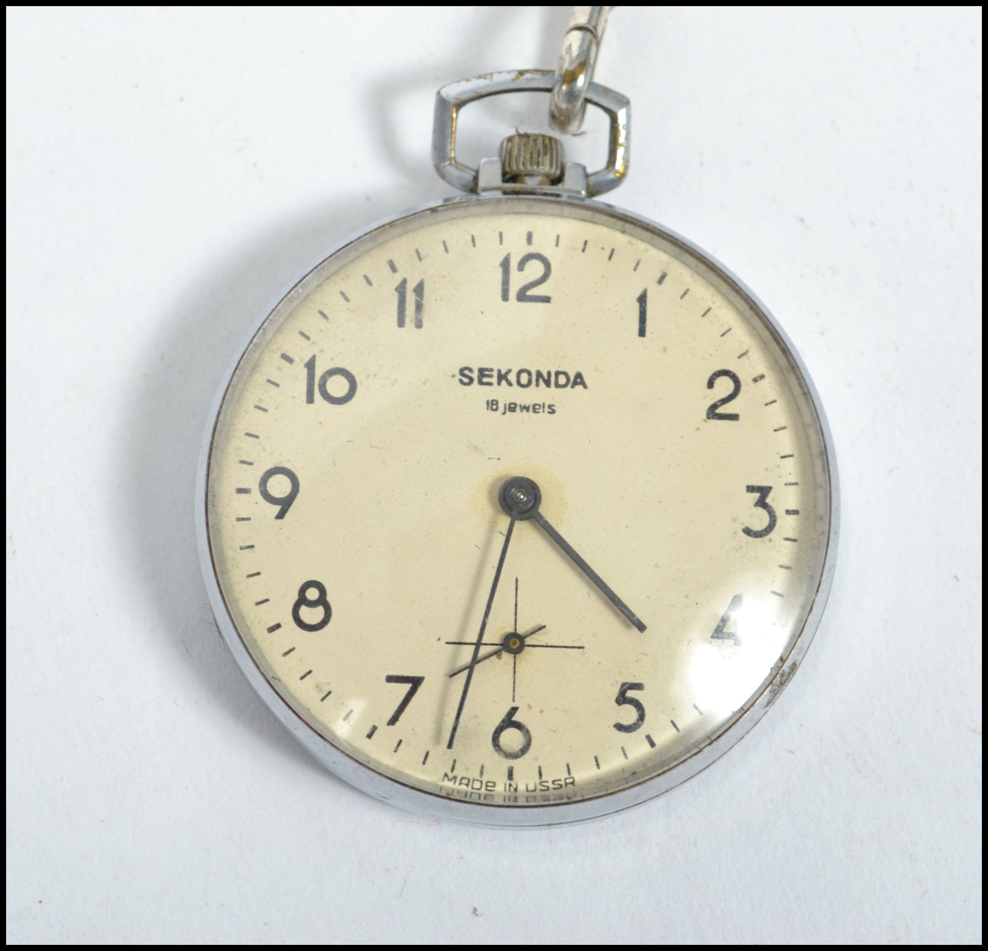 A mid century USSR made open faced Sekonda pocket watch with chain. 16 ...