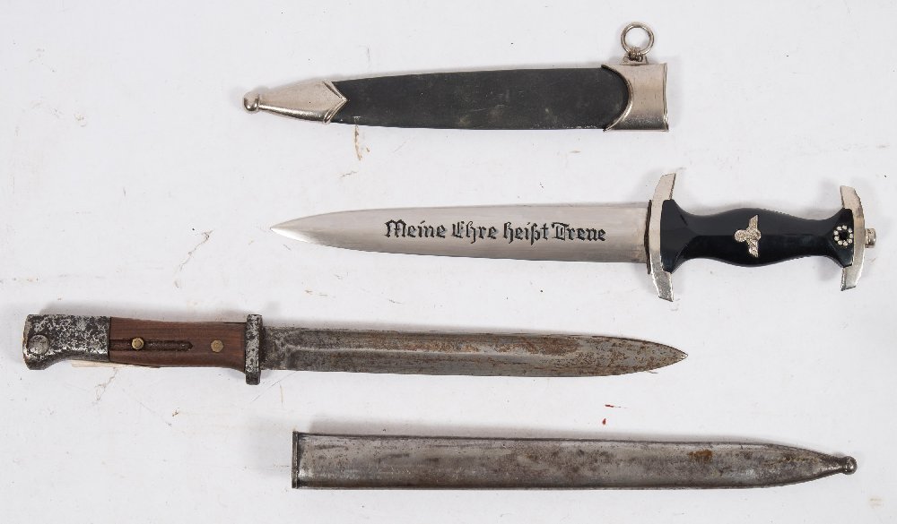 A WWII German bayonet:, stamped '44 CIS' and numbered 8975 together ...
