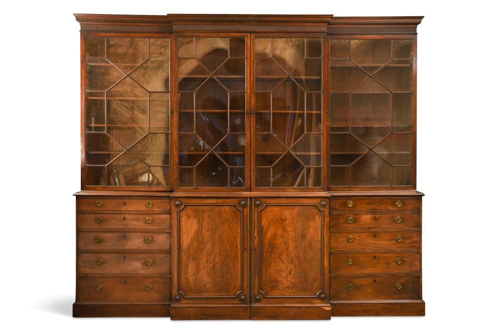 A George III mahogany breakfront library bookcase, with dentil moulded ...