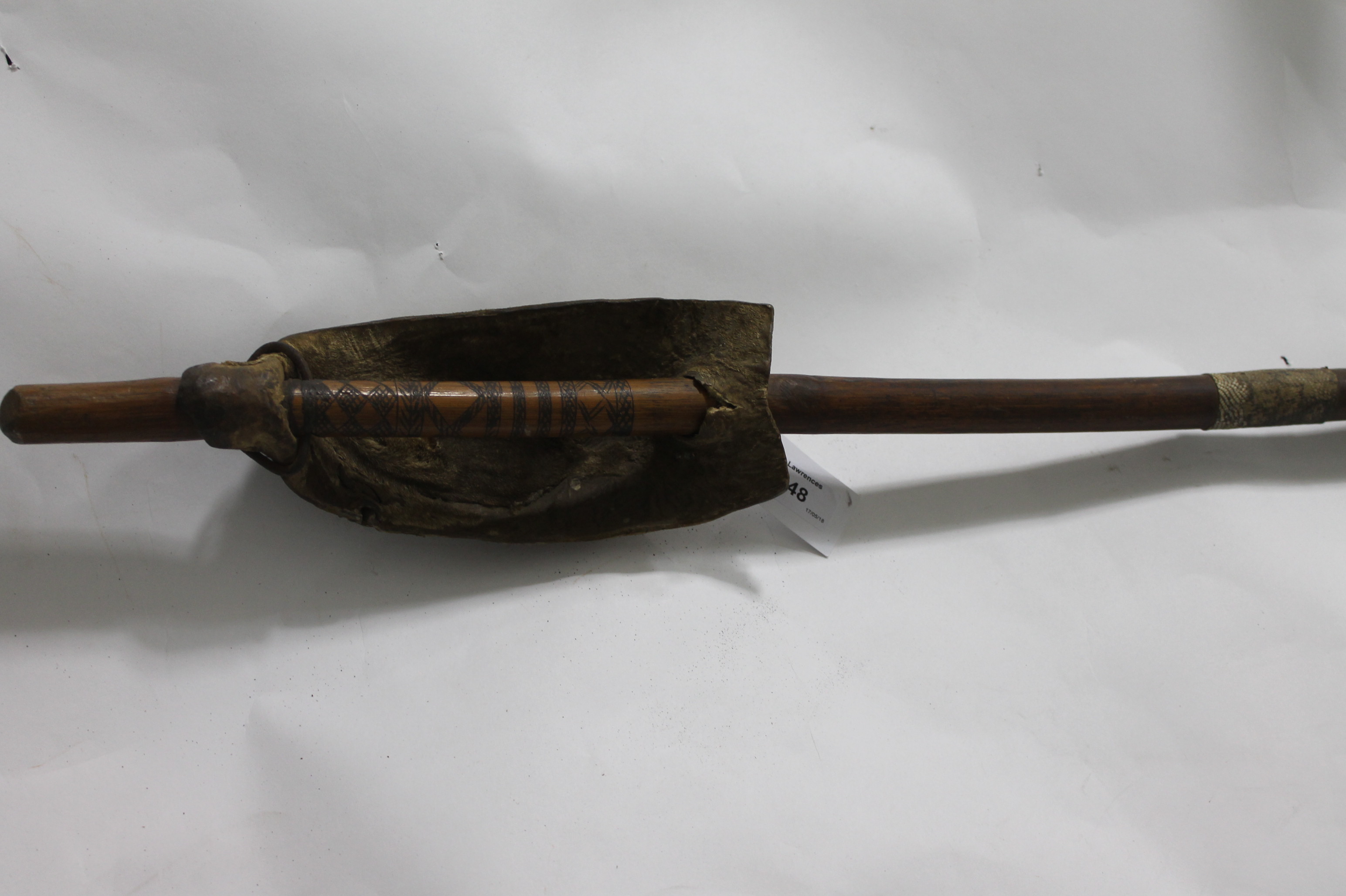 AN AFRICAN FIGHTING STICK. A Warriors fighting stick in the Zulu style ...