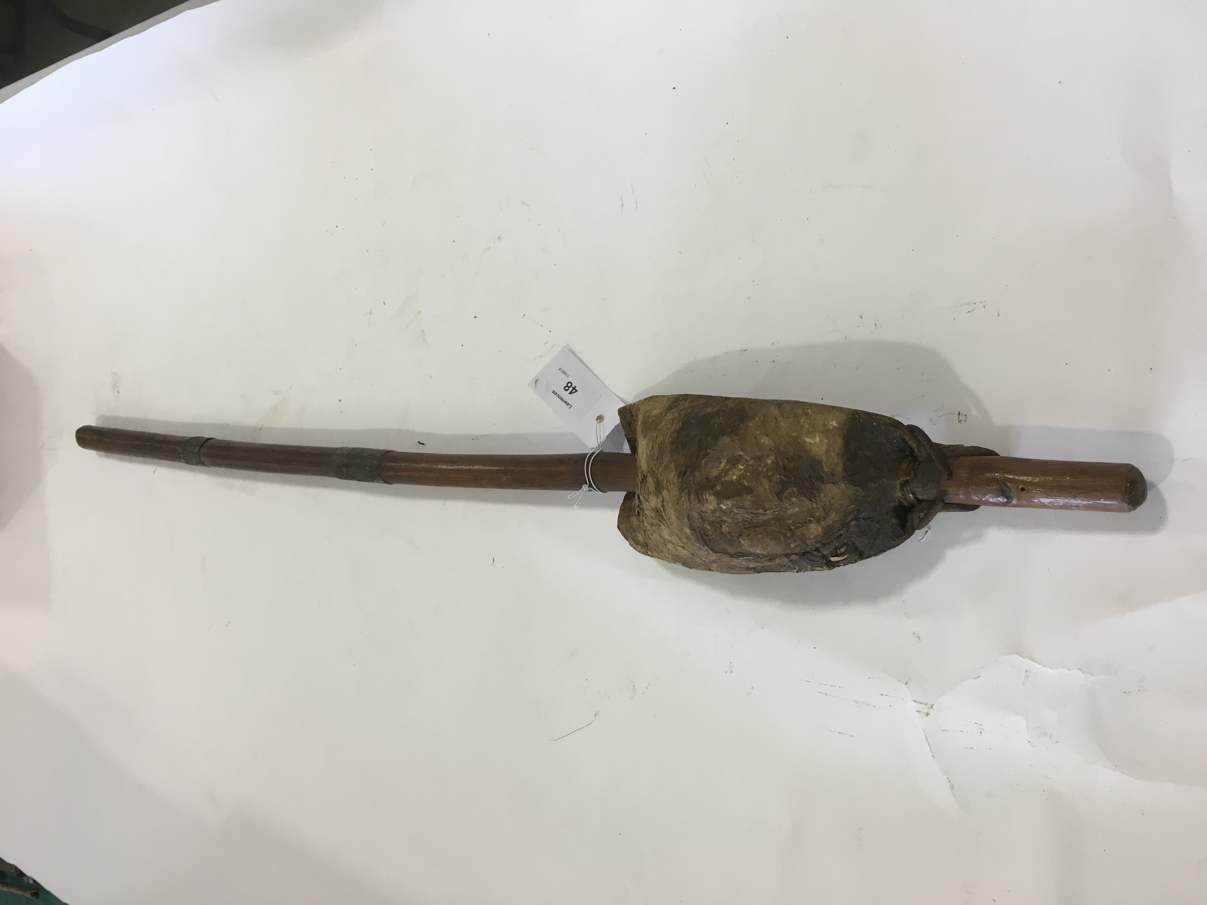 AN AFRICAN FIGHTING STICK. A Warriors fighting stick in the Zulu style ...