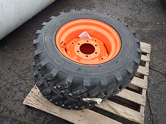 2 NEW KUBOTA 10/16.5NHS TIRES AND RIMS
