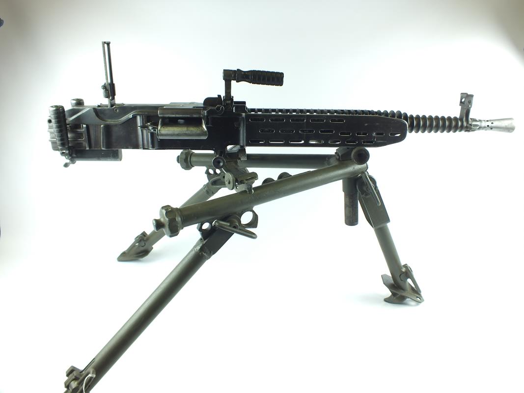 A deactivated Czechoslovakian VZ-37 machine gun with tripod, 29inch ...