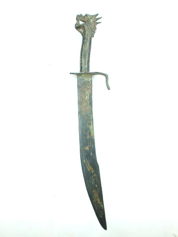 A Chinese bronze sword, 38cm scimitar form blade with clipped back ...